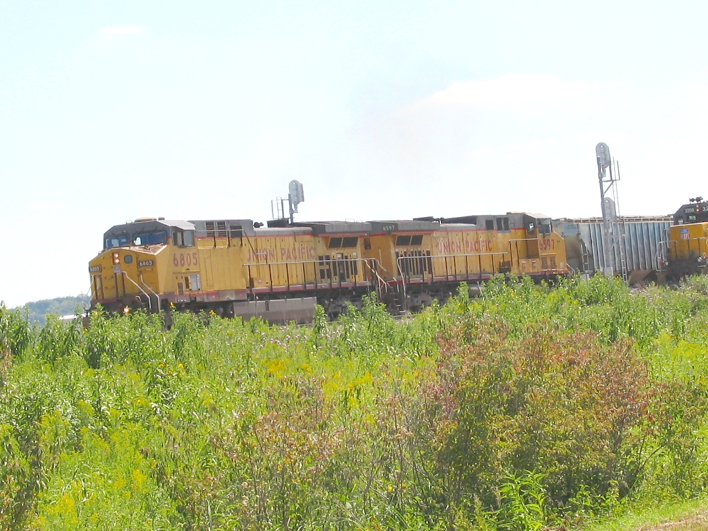 UP 6805 & UP 6597 Pass Stopped Train